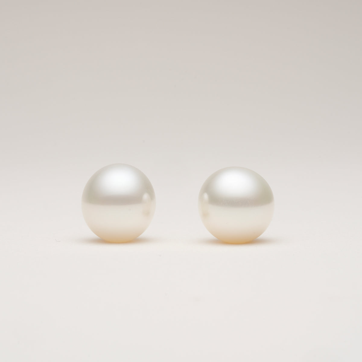 Pair of Oval 11 mm pearls, Flawless Complexion, AA Lustre, White with ...